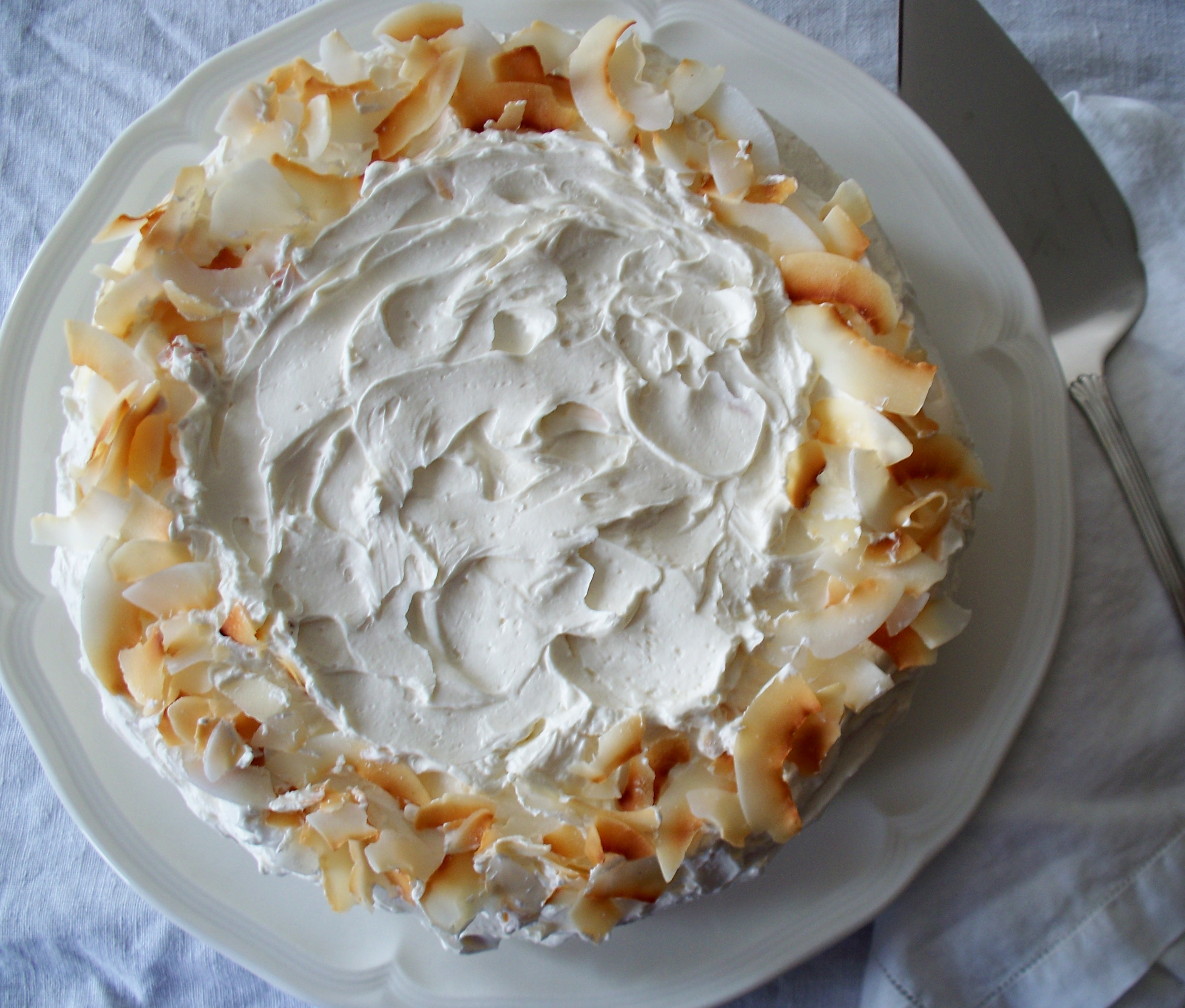 Coconut Lightning Cake with Italian Buttercream Frosting – SpoonGood